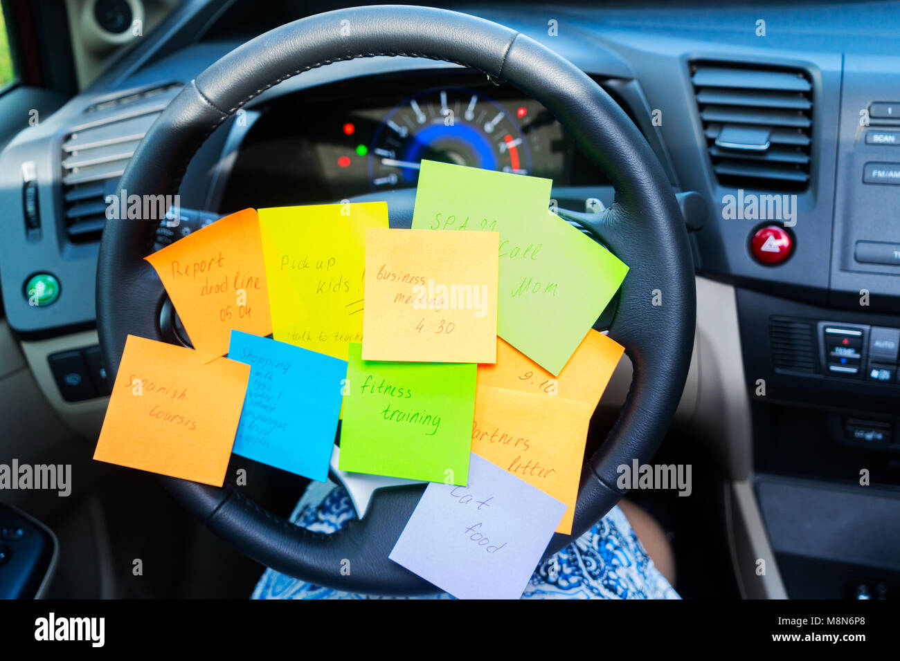 To do list in a car on driving wheel - busy day concept Stock Photo - Alamy