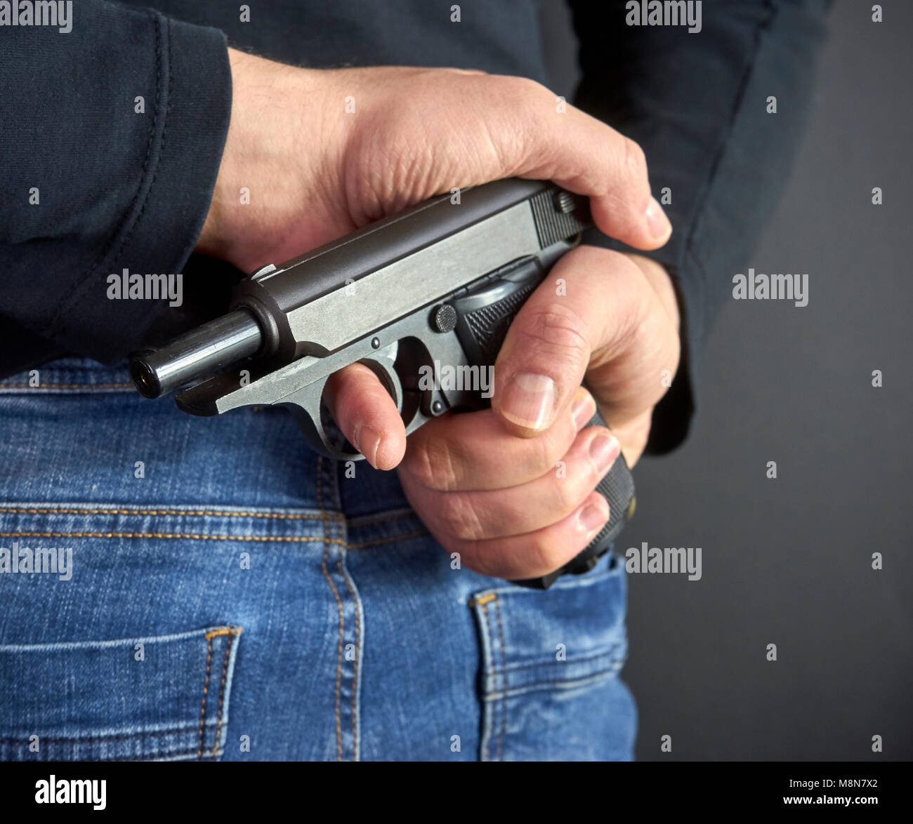 Police officer point gun black person hi-res stock photography and ...