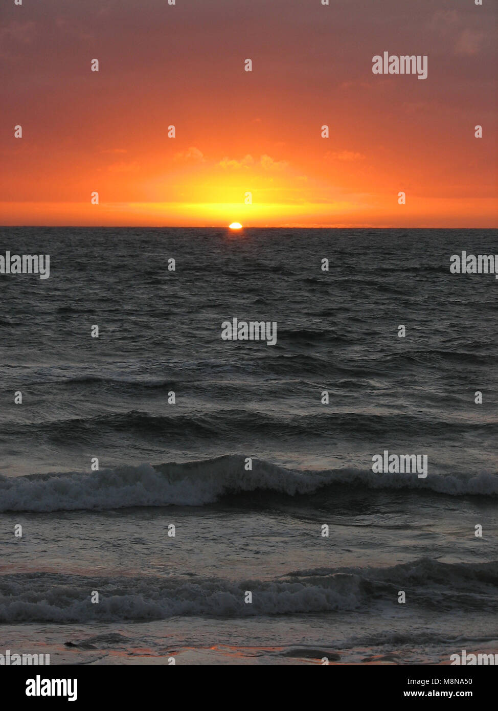 SUNSET OVER THE WATER AT SHOAL BAY, NEW SOUTH WALES, AUSTRALIA Stock ...