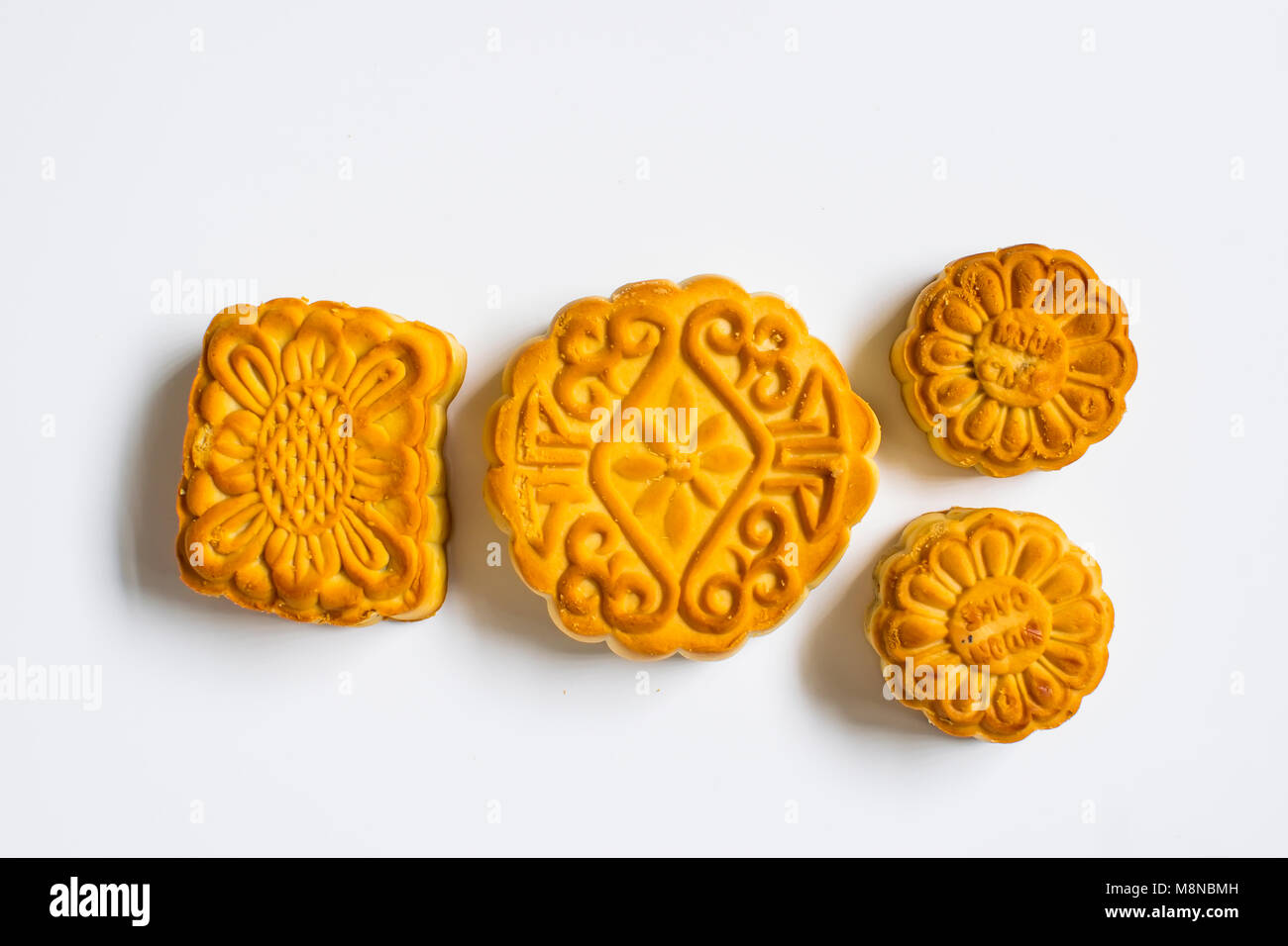 Moon cake for Chinese mid autumn festival. Isolated on white. Copy ...