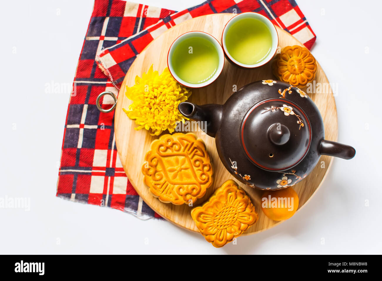 Moon cake and tea for Chinese mid autumn festival. Isolated on white ...