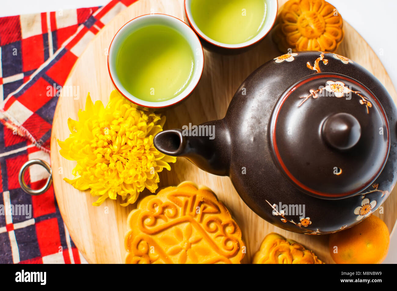 Moon cake and tea for Chinese mid autumn festival. Isolated on white ...