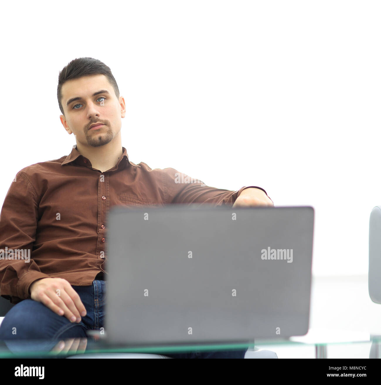 closeup.brooding guy with a laptop Stock Photo - Alamy