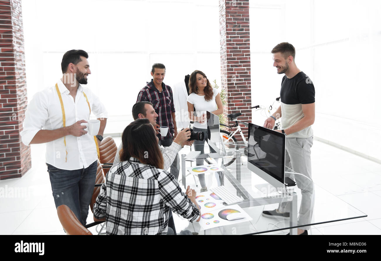 group of designers working in a modern office Stock Photo - Alamy
