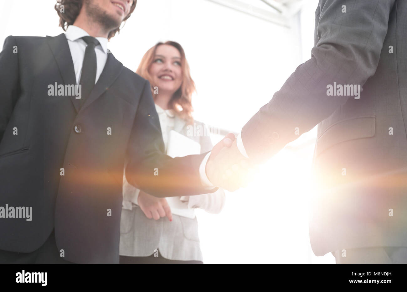Photo of handshake of two happy businessmen Stock Photo - Alamy