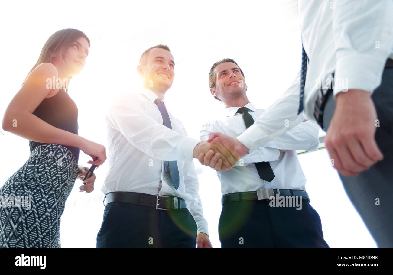 bottom view.handshake business colleagues Stock Photo - Alamy