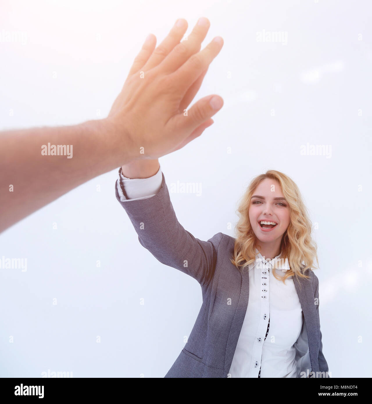 successful business woman giving a high five Stock Photo - Alamy