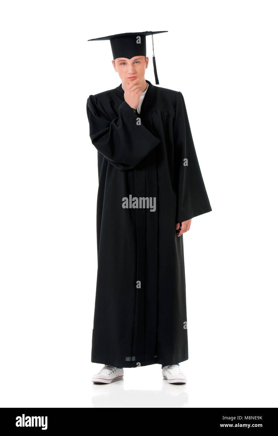 Handsome graduate guy student in mantle with diploma, isolated on white ...