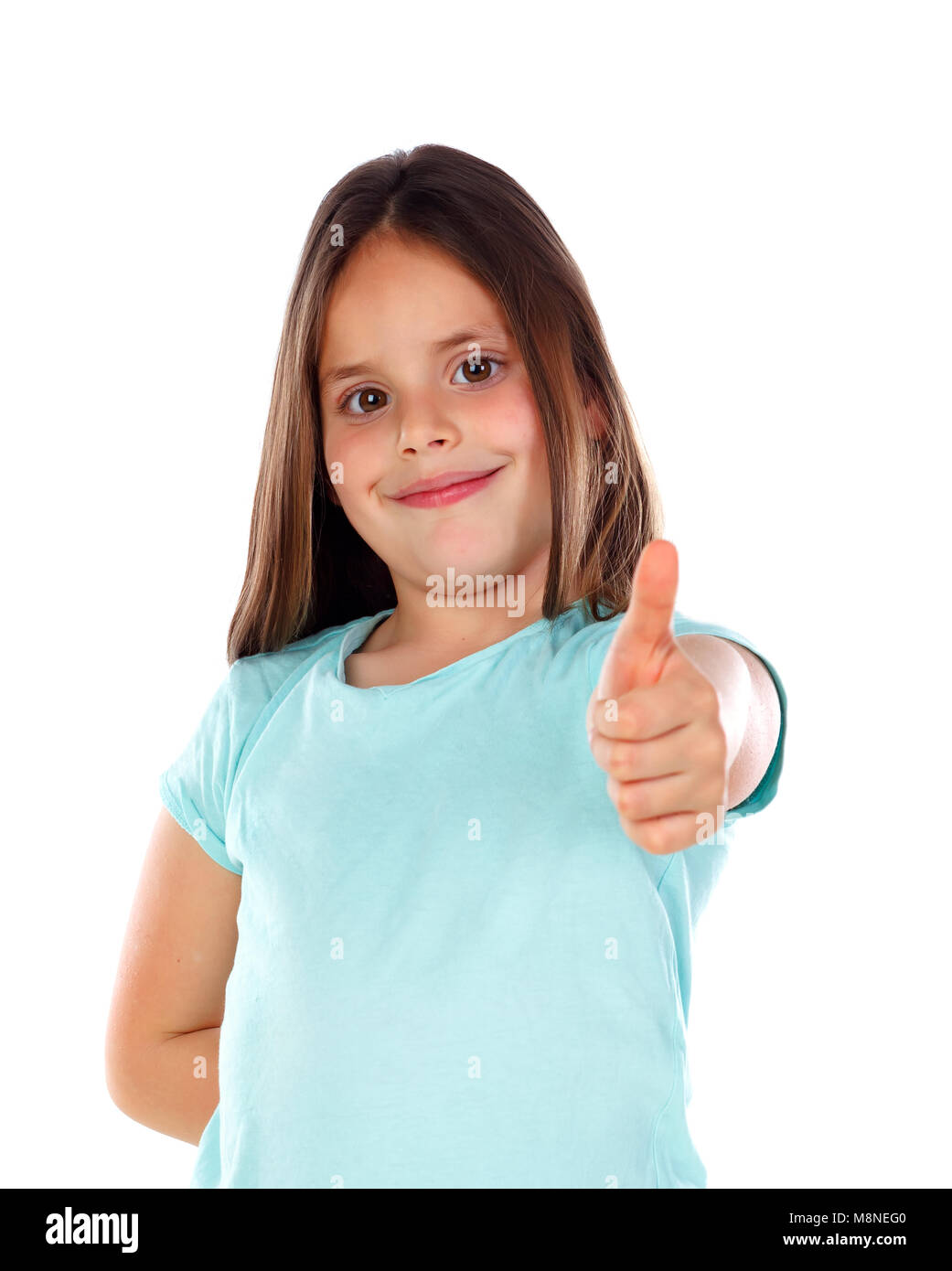 Friendly child saying Ok with her thumbs isolated on a white background ...