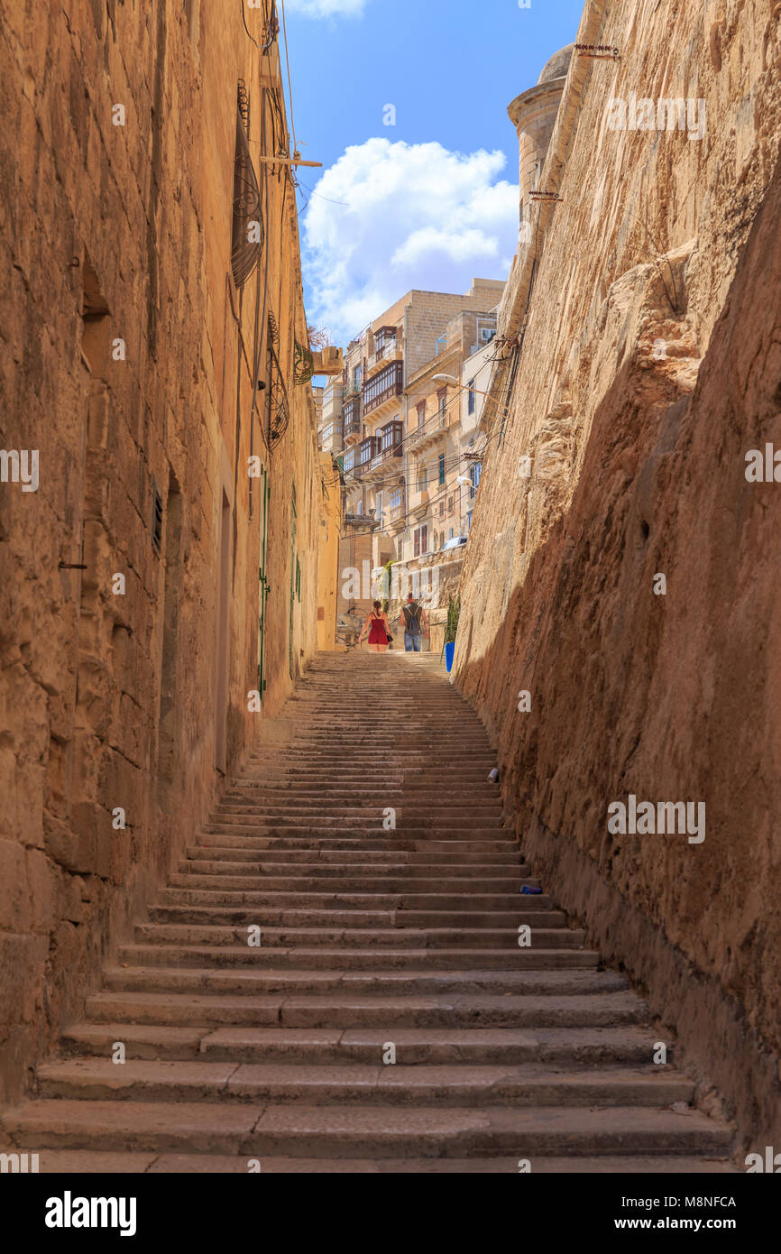 Stone steps hewn from the bedrock of Valletta, Malta Stock Photo - Alamy