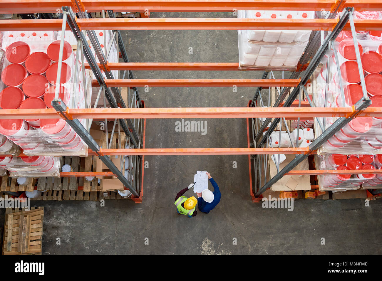 Top view background image of tall shelf rows in modern warehouse with ...