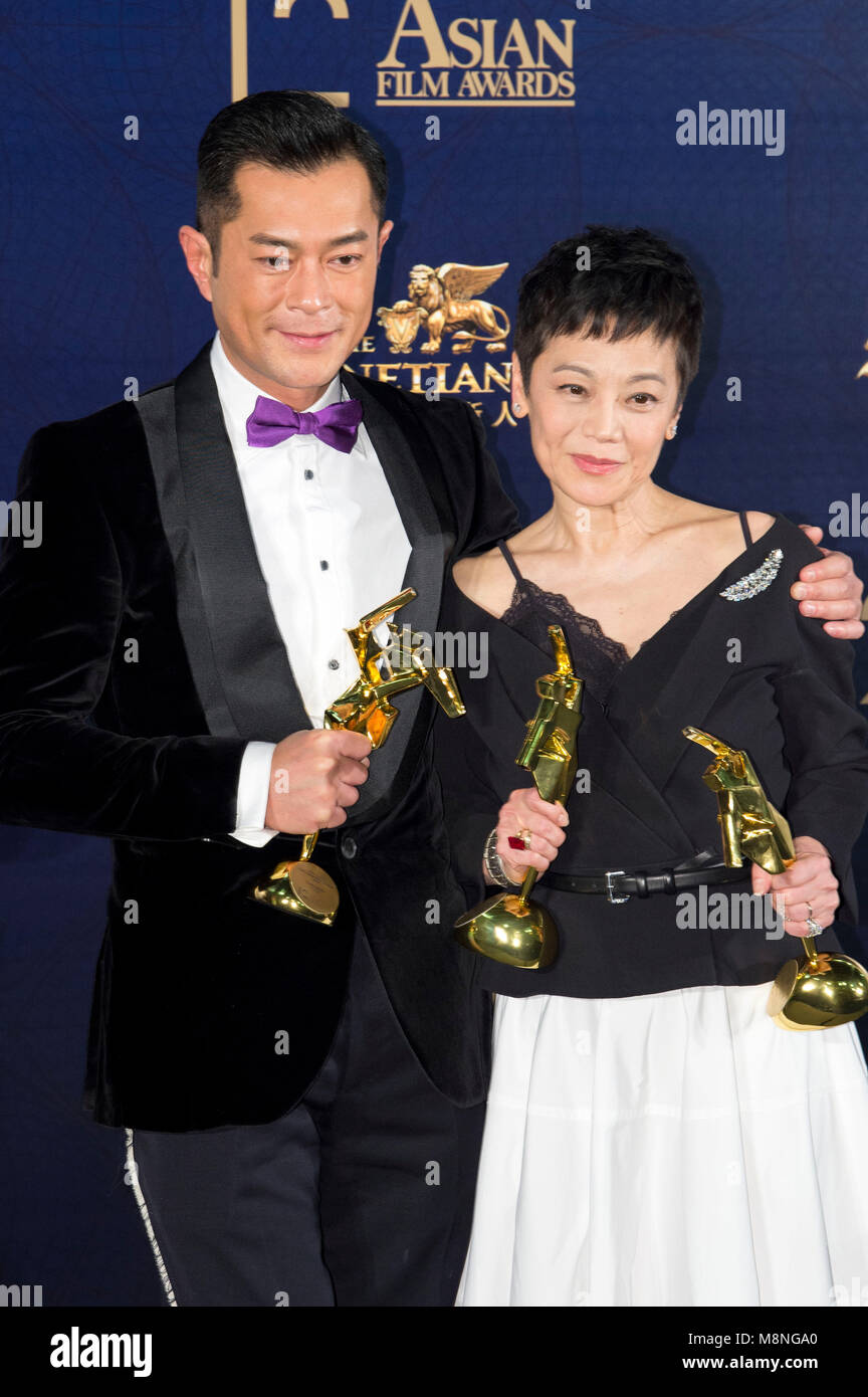 Louis Koo and Sylvia Chang attending the 12th Asian Film Awards ...