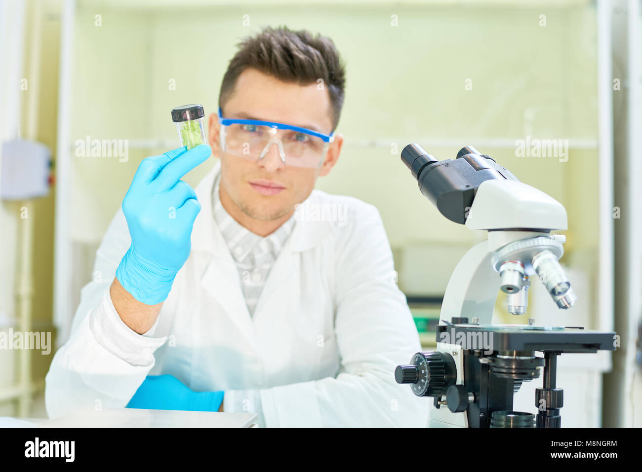 Confident Young Researcher Posing for Photography Stock Photo - Alamy