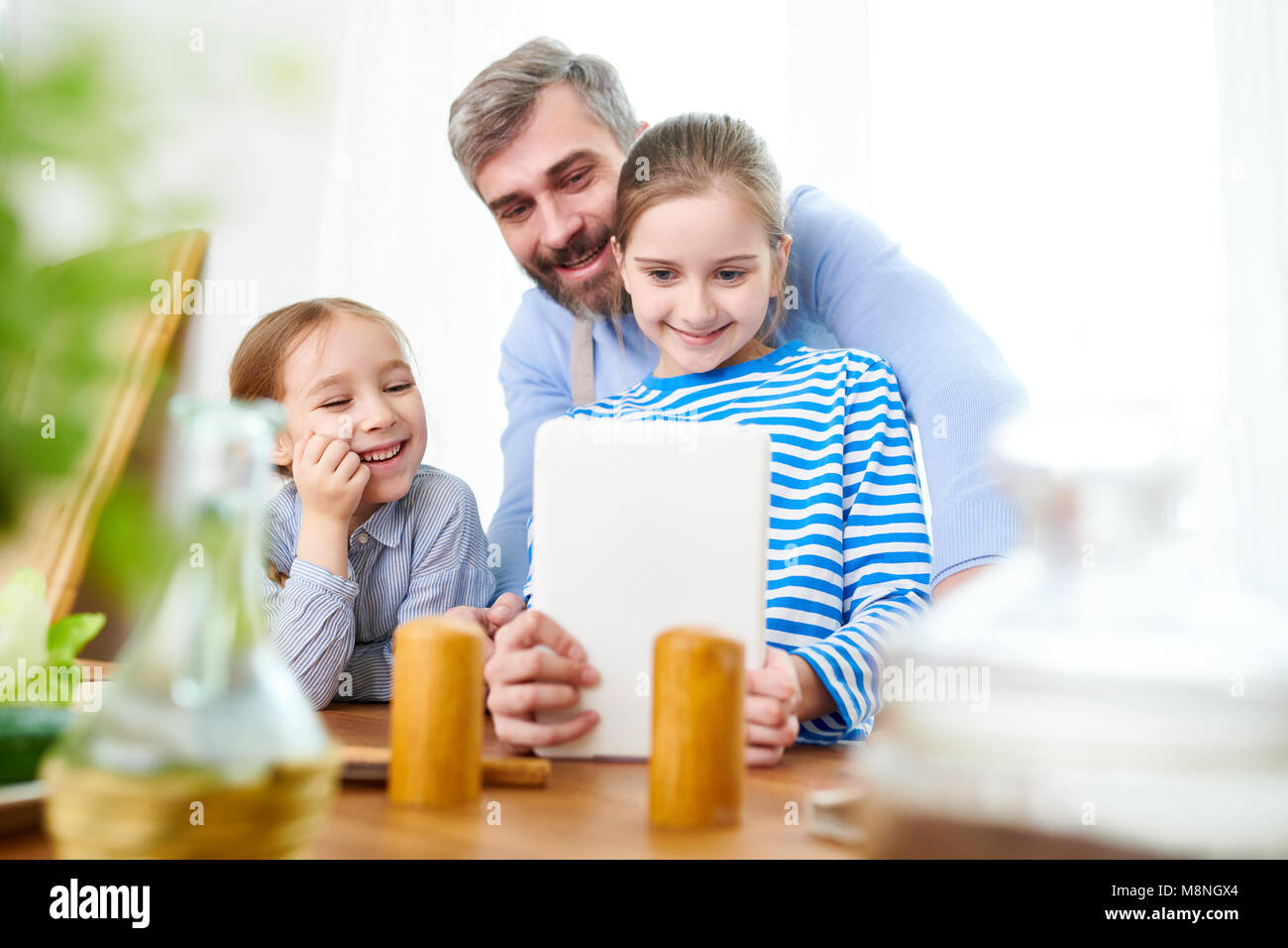 Happy Father of Two Girls Stock Photo - Alamy
