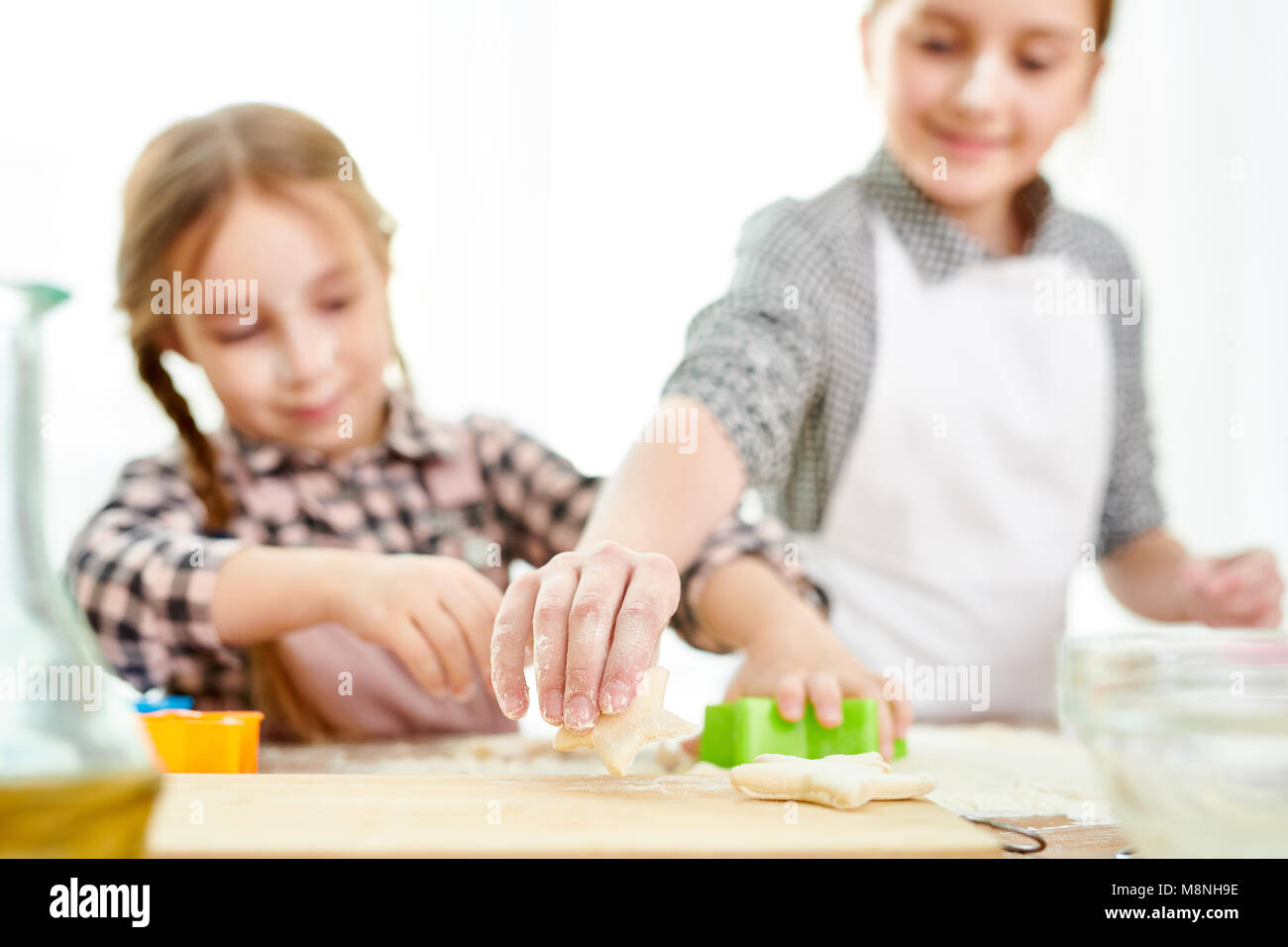 Little Girls Making Cookies Stock Photo - Alamy