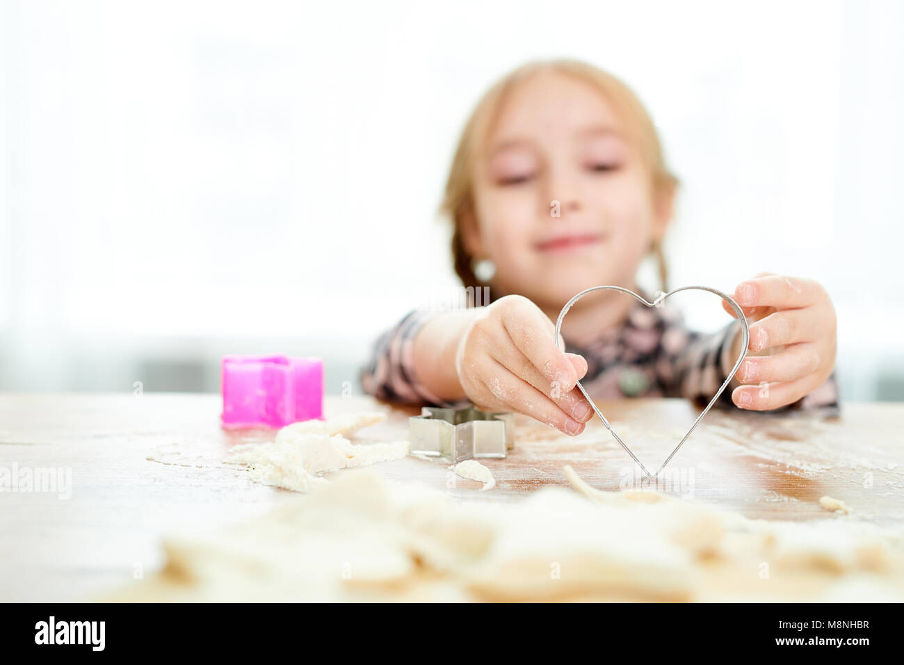 Little Girl Making Cookies Stock Photo - Alamy