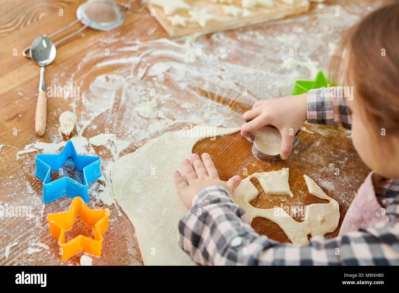 Cute Little Girl Making Cookies Stock Photo - Alamy