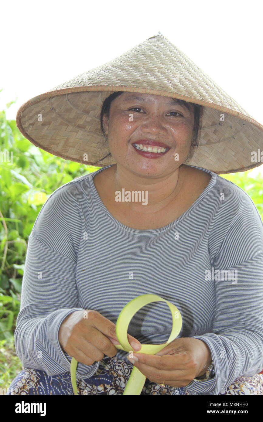 Farmer wearing traditional straw hat hi-res stock photography and ...