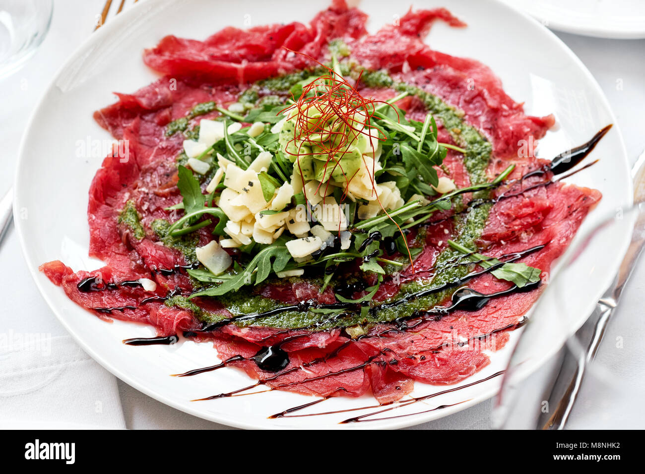 Carpaccio meat parmesan cheese hi-res stock photography and images - Alamy