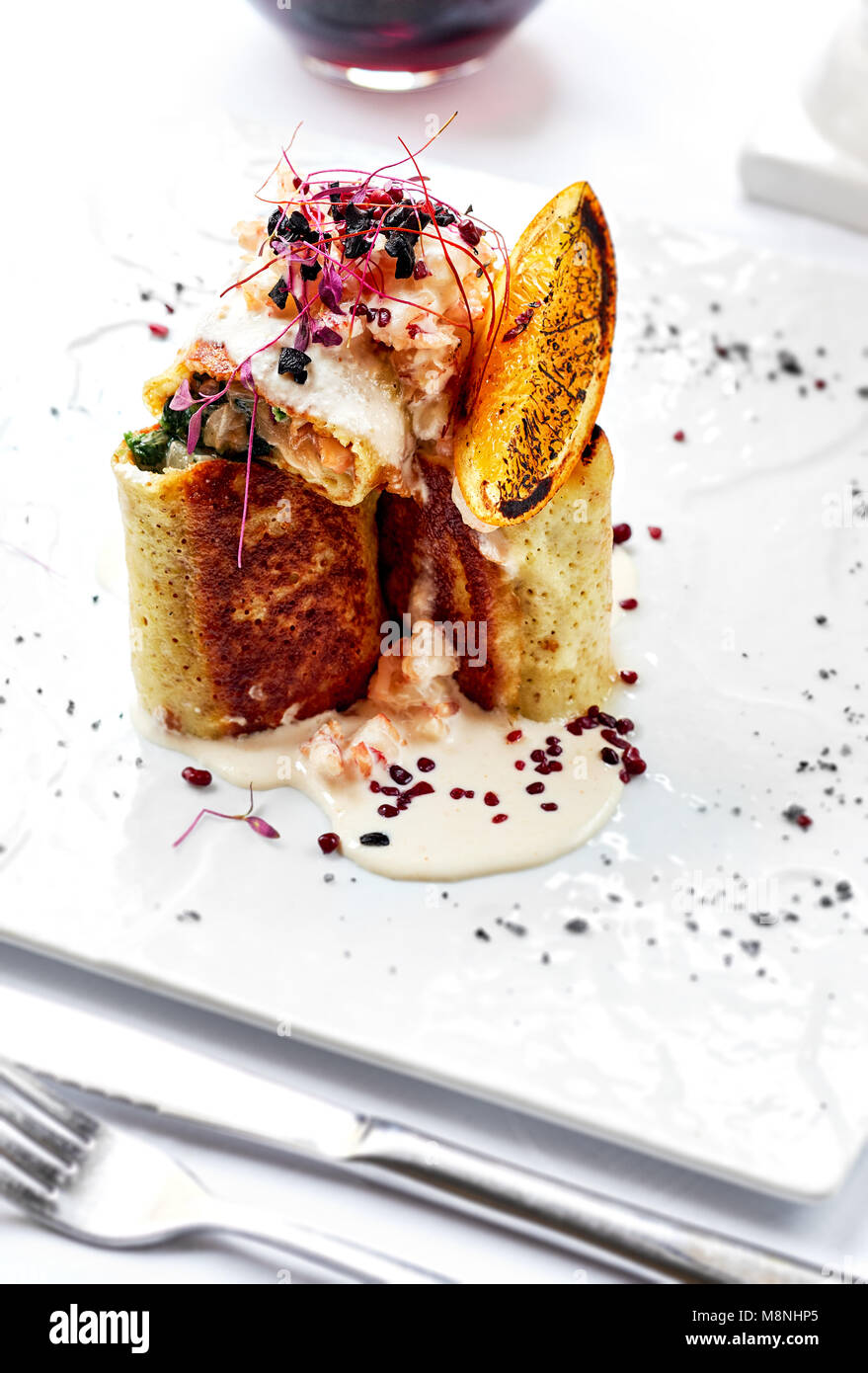 Crepes with prawns and cream cheese sauce Stock Photo - Alamy