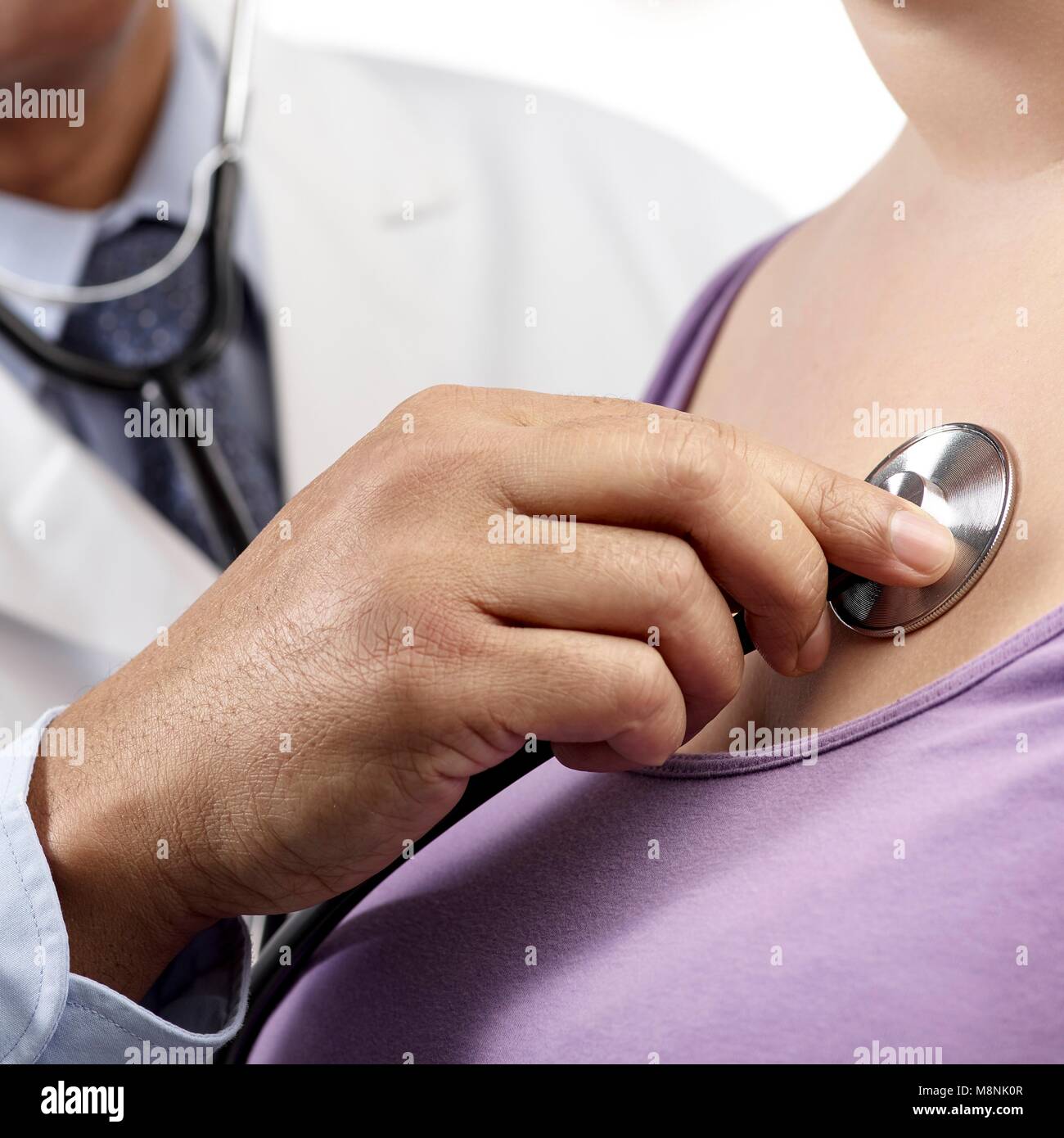 Doctor examine woman patient hi-res stock photography and images - Alamy