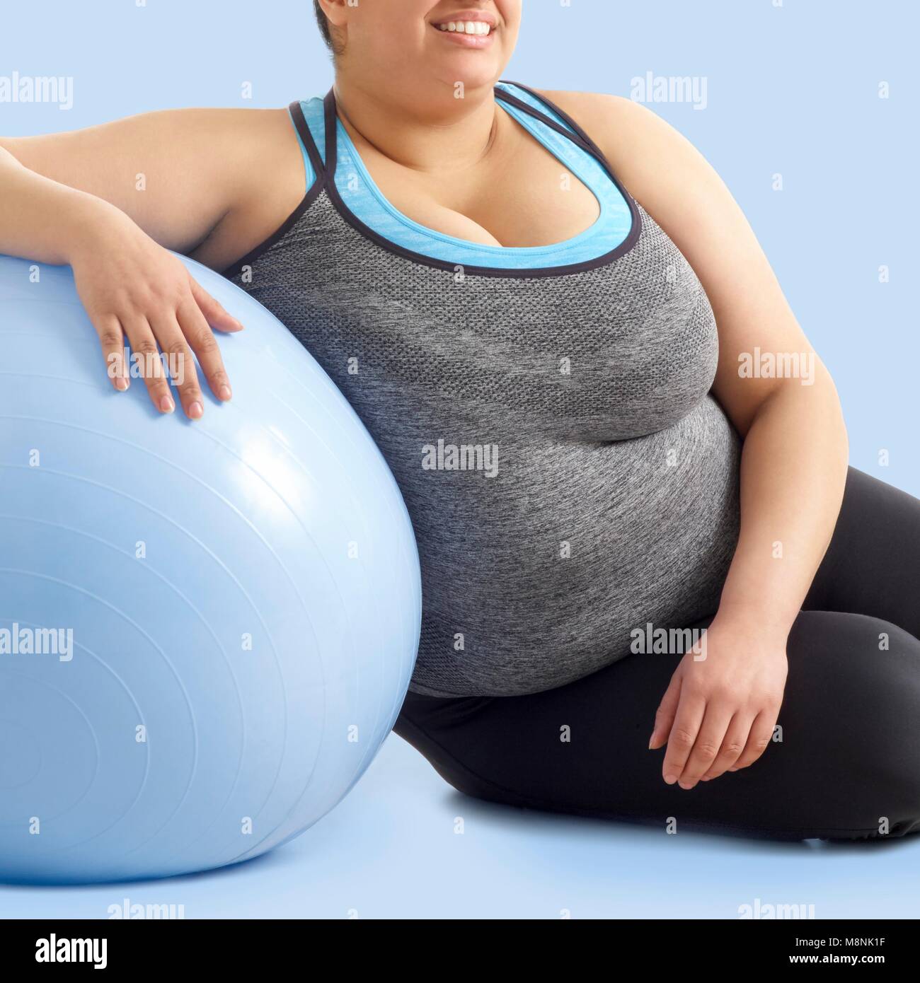 Overweight woman exercise exercising hi-res stock photography and ...
