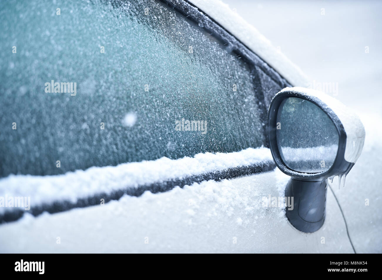 Car covered in ice during freezing rain phenomenon Stock Photo - Alamy