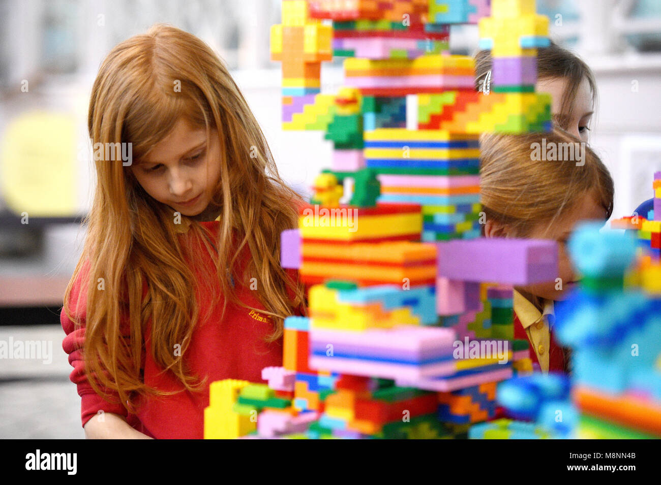 Pupils from the Globe Primary School build a Lego sculpture at the V&A ...