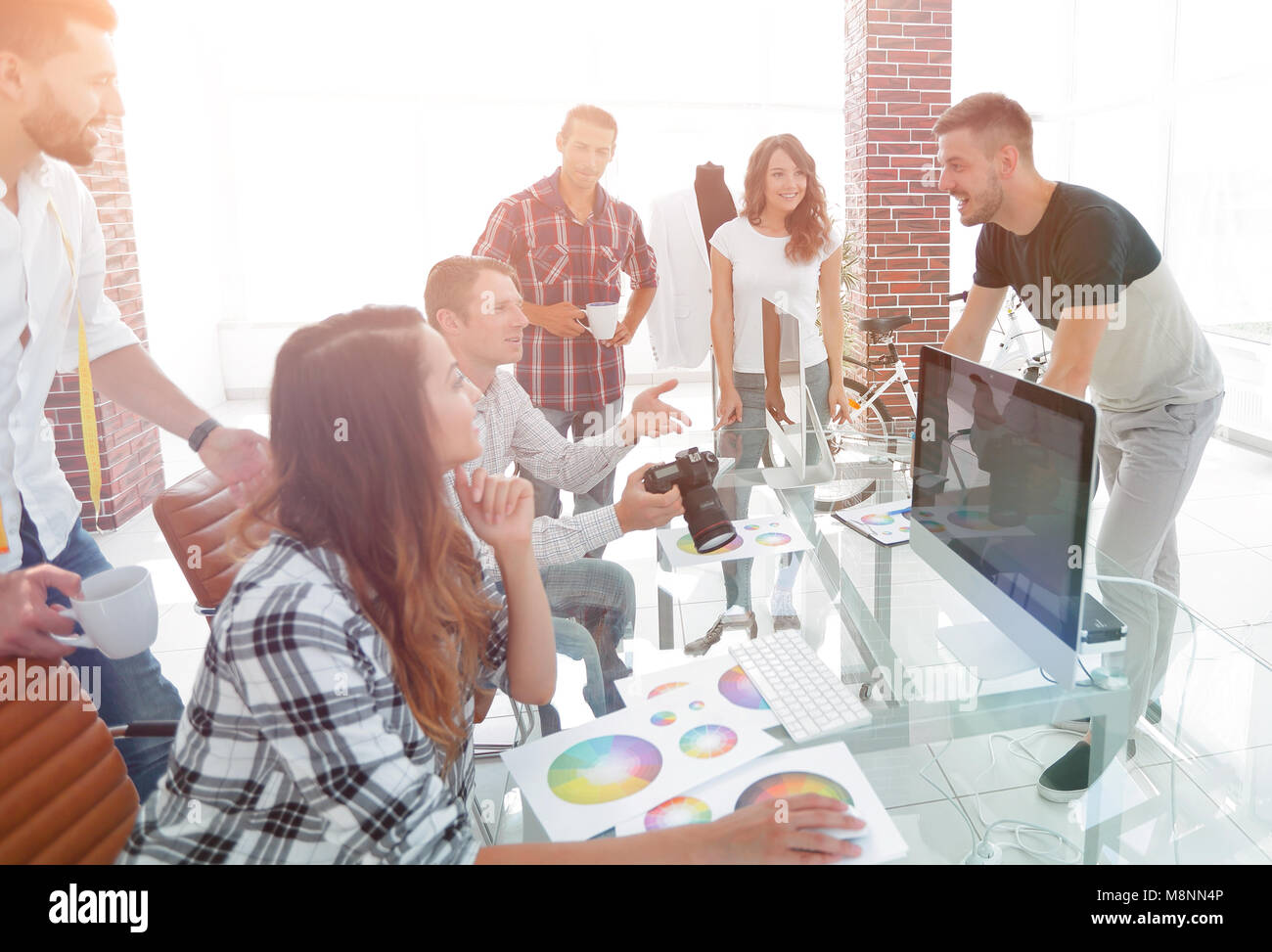 group of designers working in a modern office.photo with copy space ...