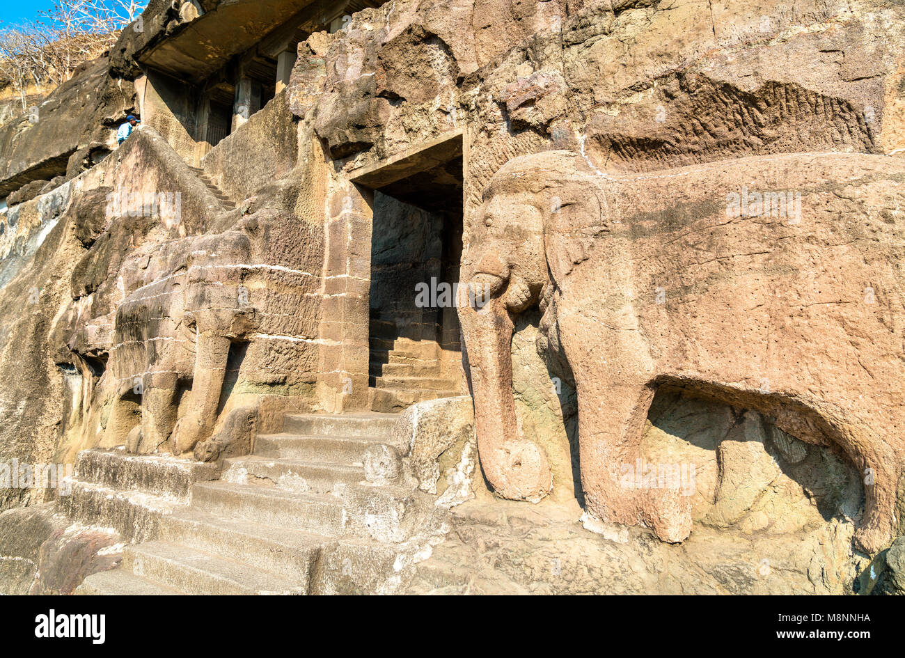 Carved elephants at the entrance of Cave 16, the Ajanta Caves Complex ...