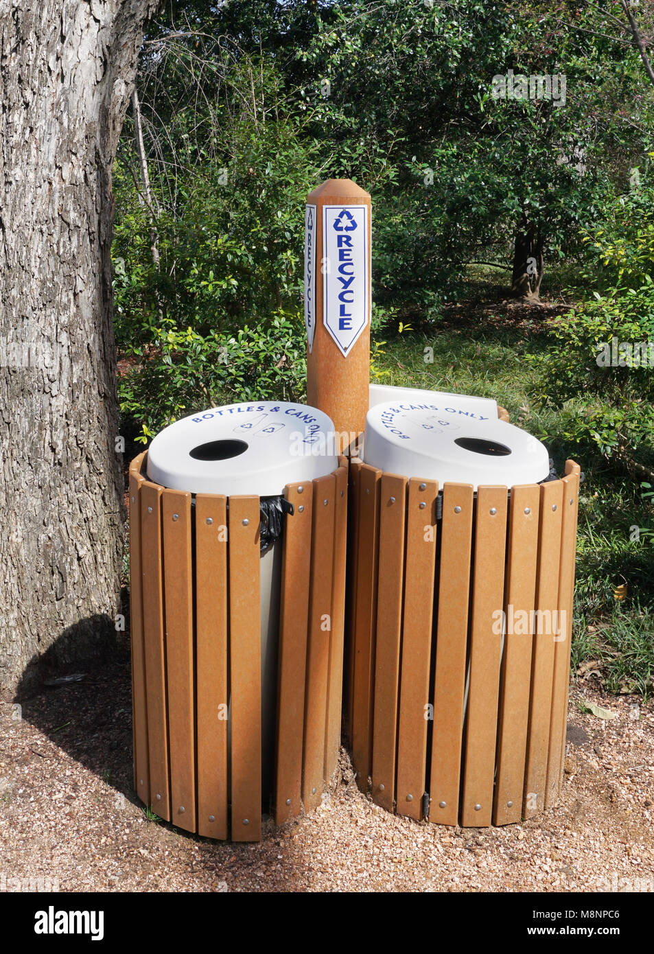 Two modern looking recycle bins outside Stock Photo - Alamy