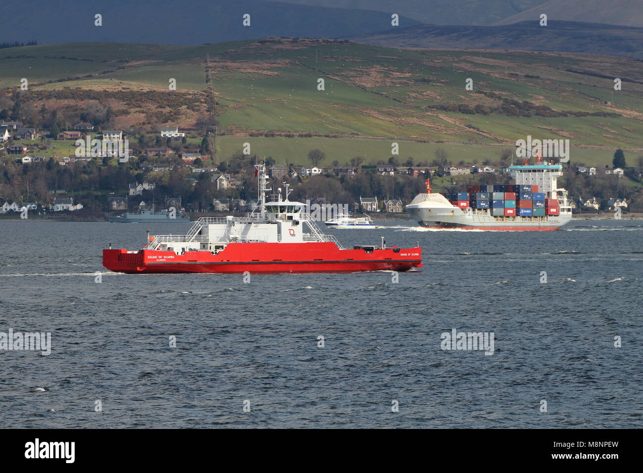The car ferry MV Sound of Scarba, the container ship Flintercape, the ...