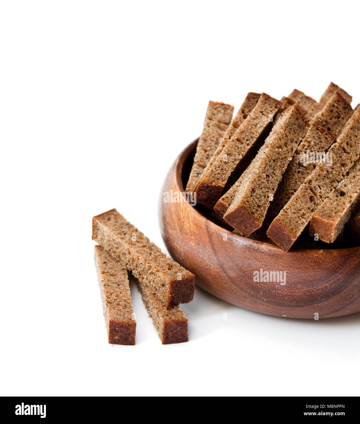 Rye bread crackers in wooden bowl isolated on white Stock Photo - Alamy