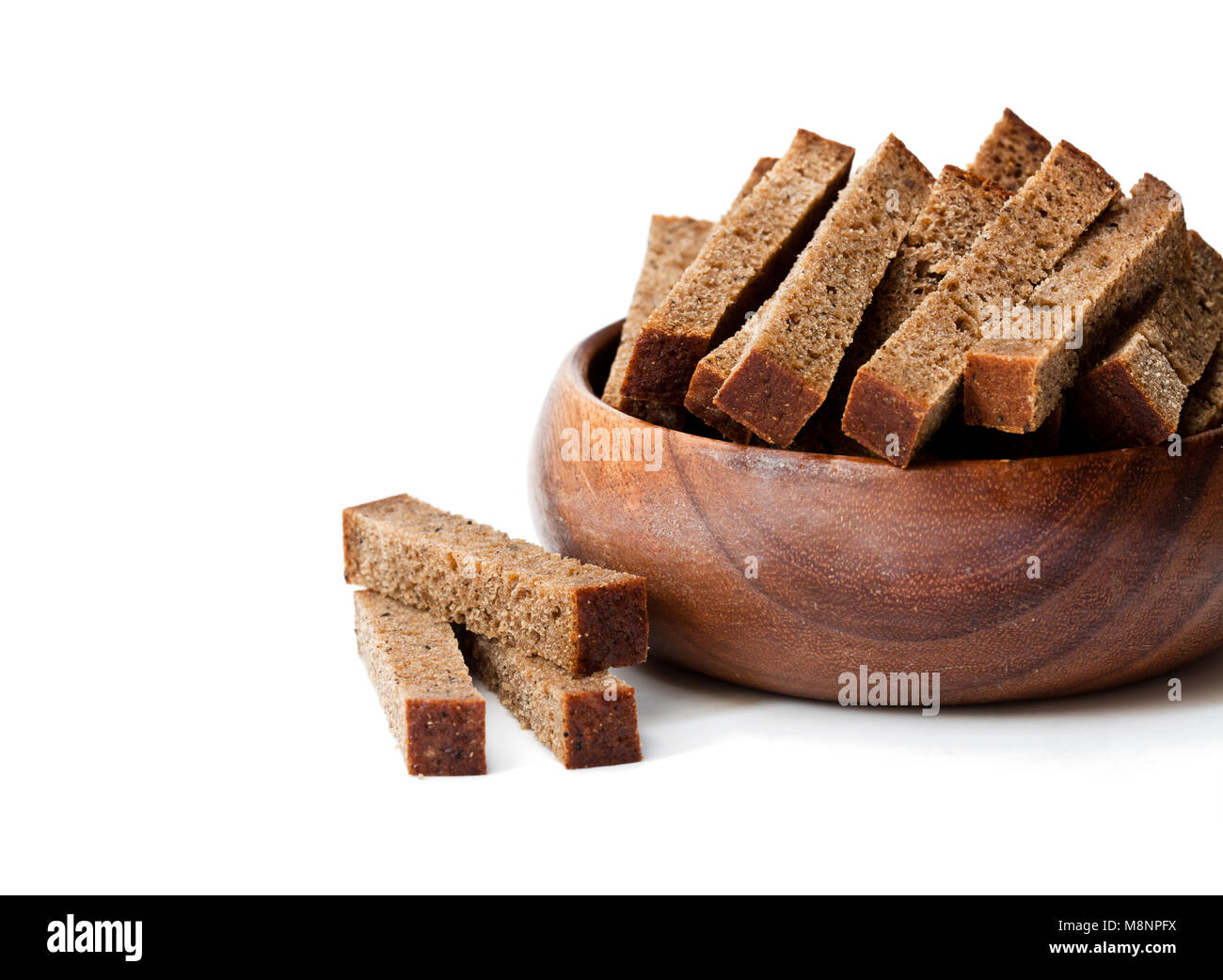 Rye bread crackers in wooden bowl isolated on white Stock Photo - Alamy