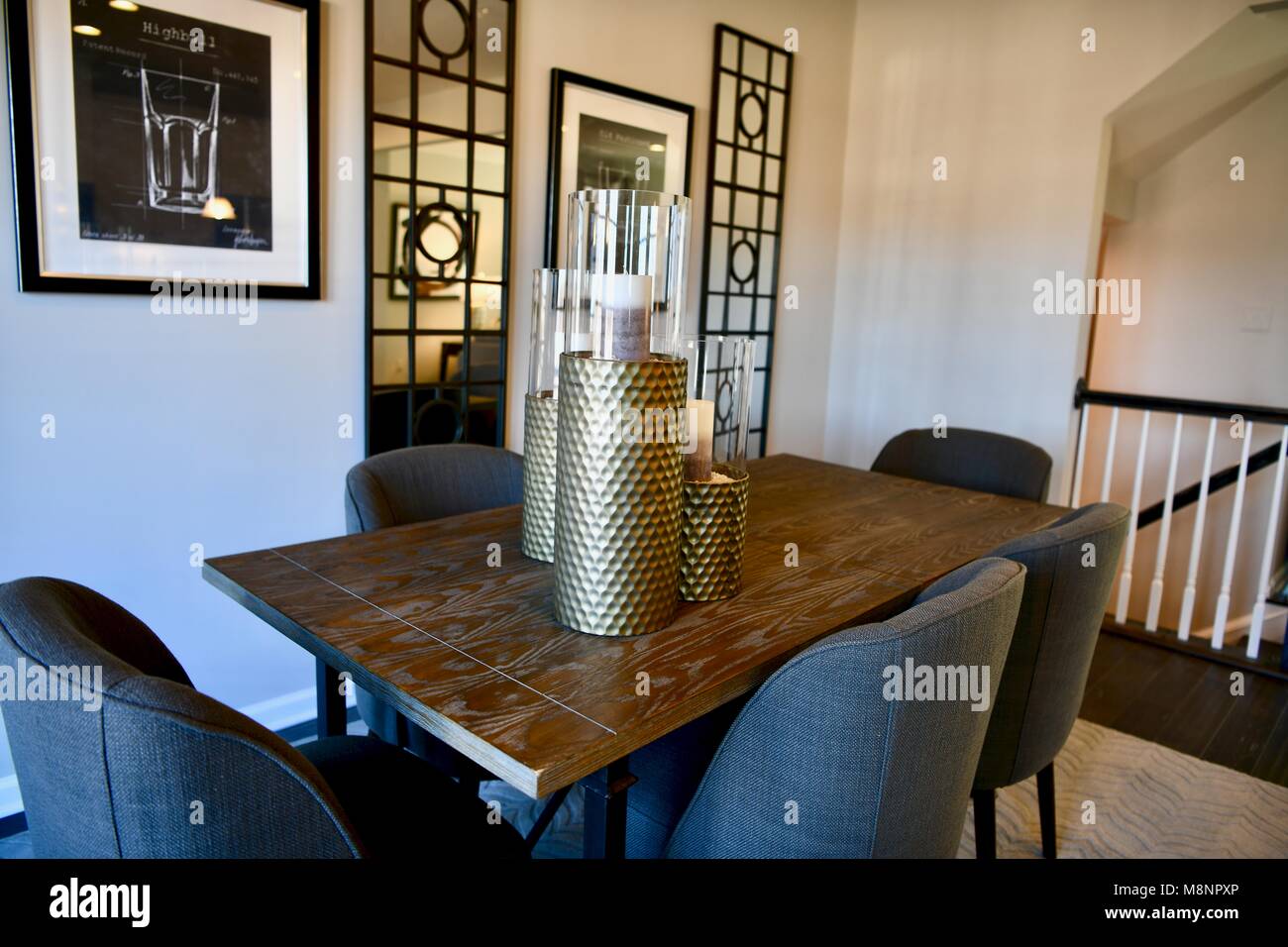 Dining room view with wood table inside modern home Stock Photo - Alamy