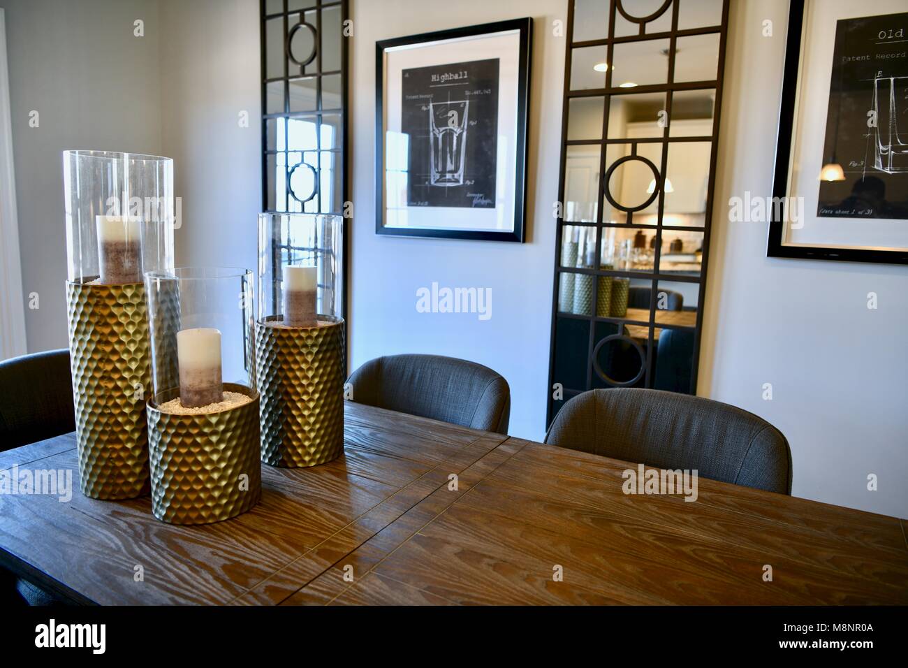Dining room view with wood table inside modern home Stock Photo - Alamy