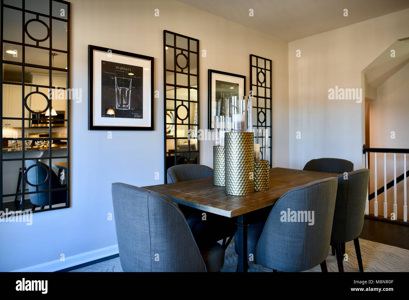 Dining room view with wood table inside modern home Stock Photo - Alamy
