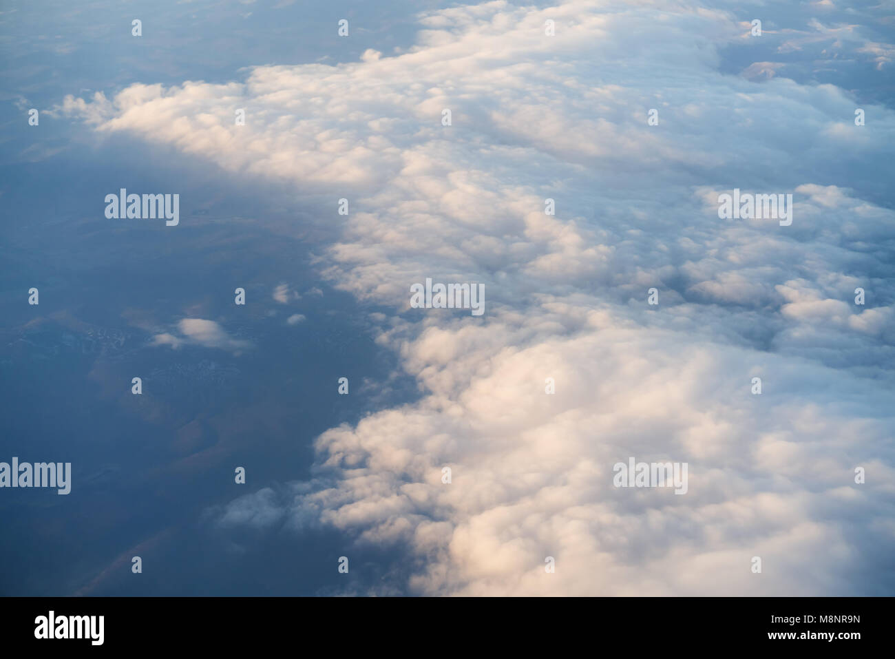 flying above the clouds in the morning, skyscape Stock Photo - Alamy