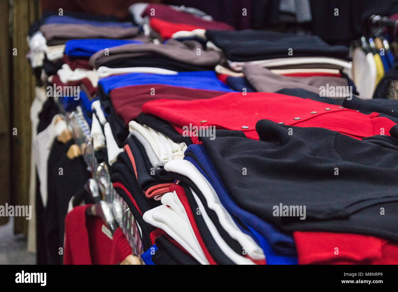 Shirts on a shelf hi-res stock photography and images - Alamy