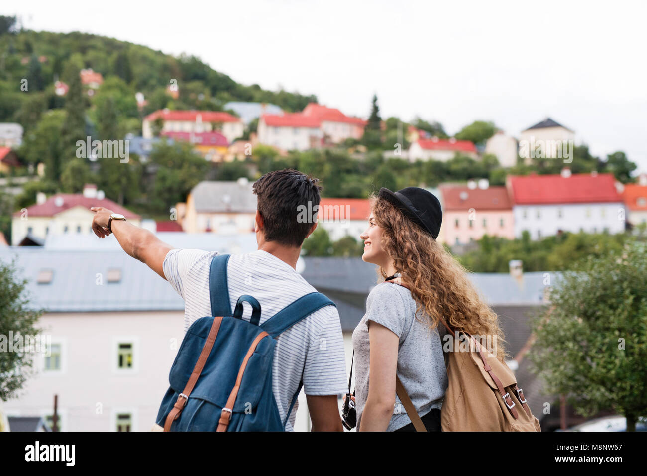 Two young tourists with camera in the old town Stock Photo - Alamy