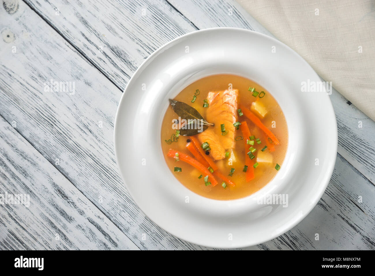 Portion of salmon soup Stock Photo - Alamy