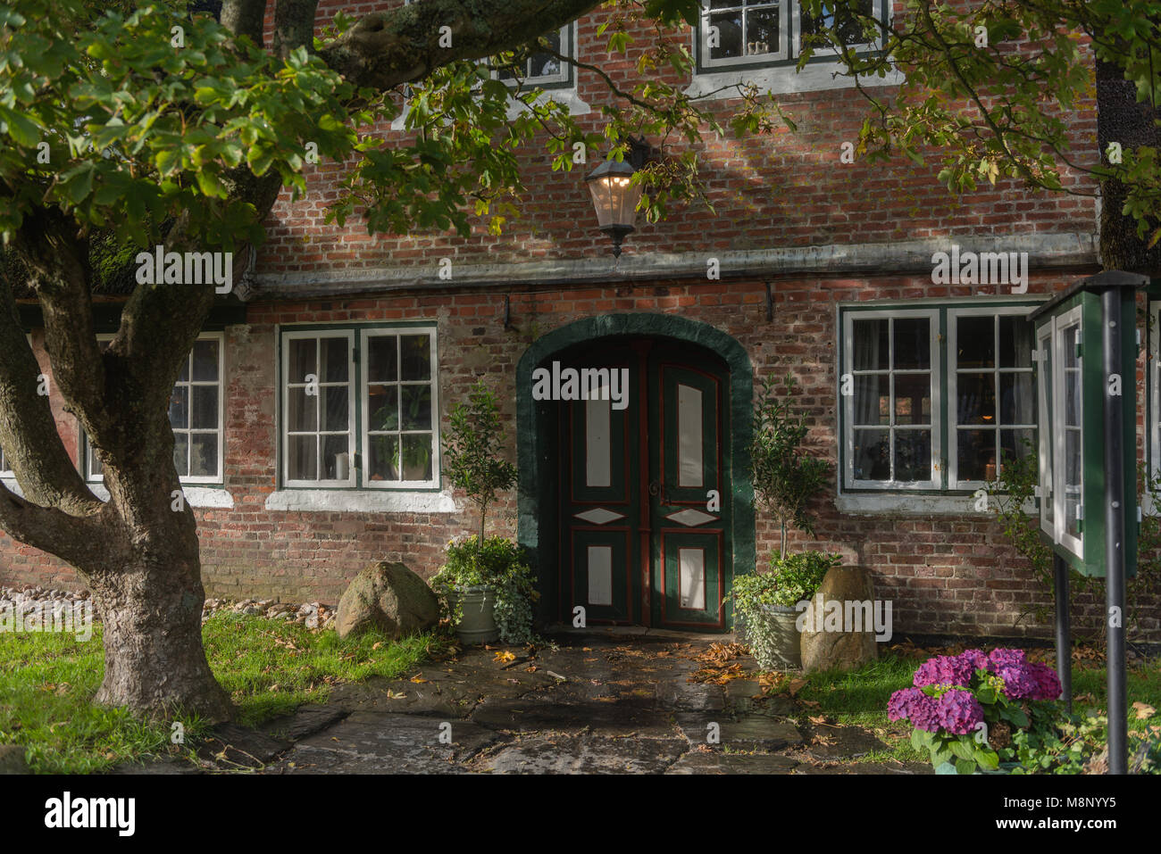 Typical Danish house in Soenderho, island of Fanoe, Jutland, Denmark ...