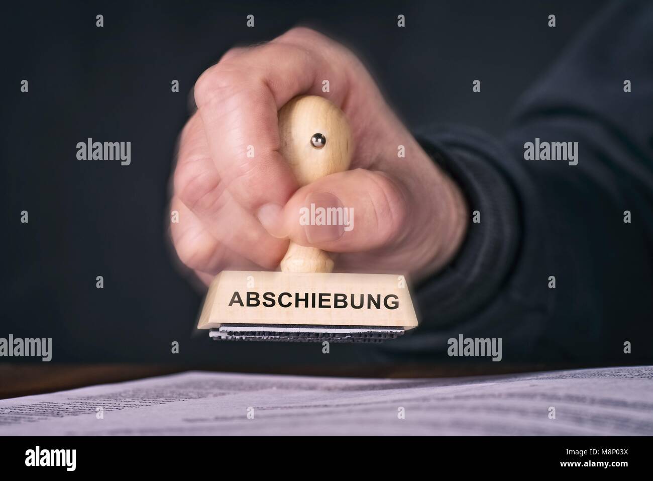 A document is stamped with a stamp bearing the german inscription ...