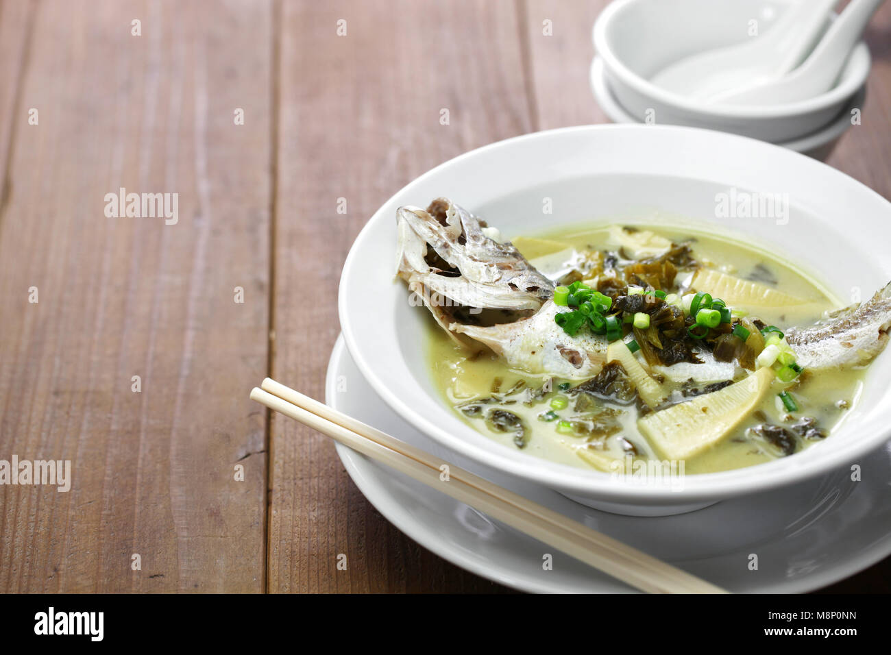 yellow croaker fish soup with preserved snow vegetable, chinese cuisine ...