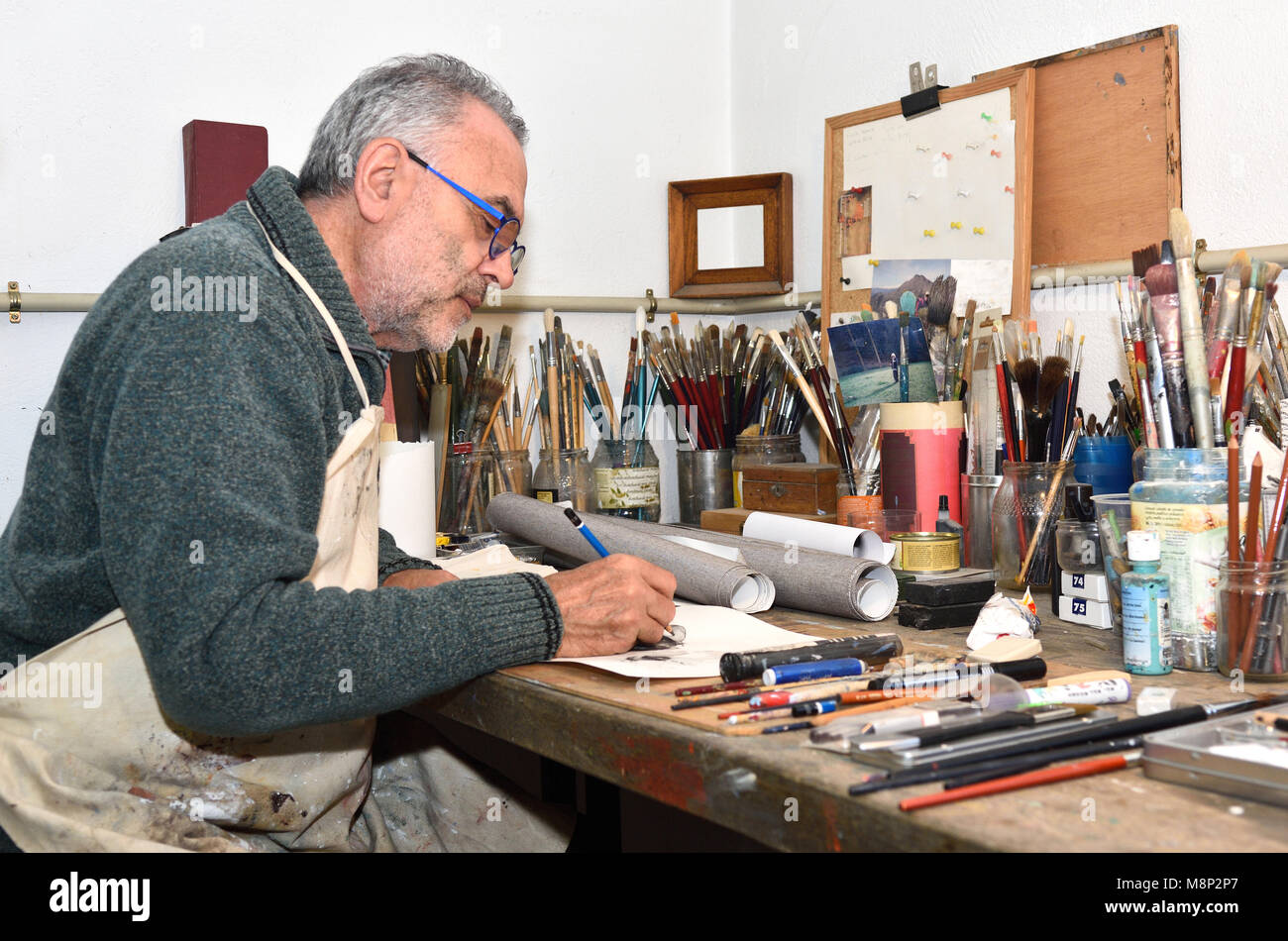 artist drawing in the studio Stock Photo - Alamy