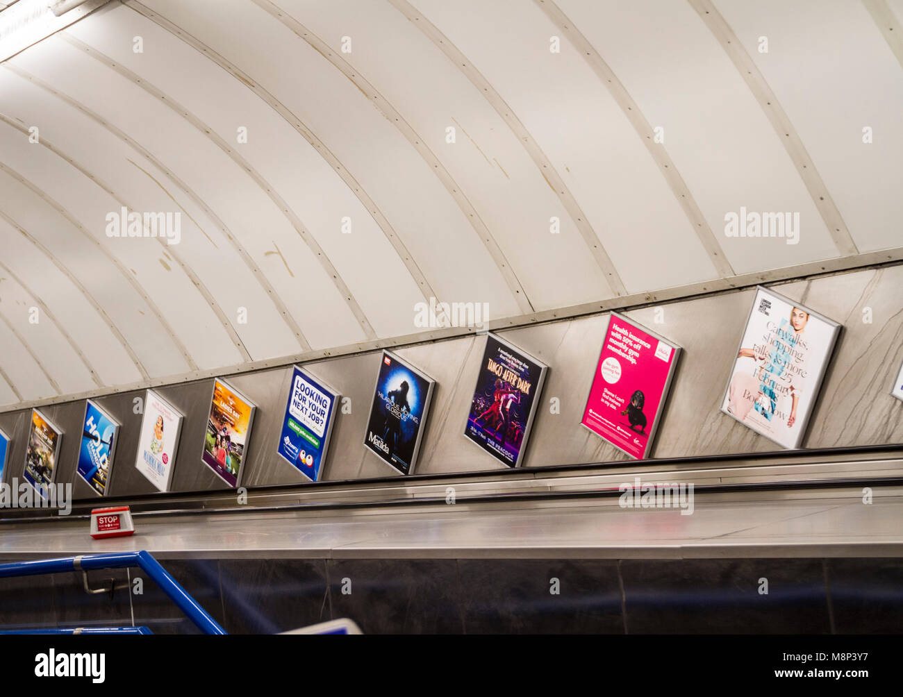 London Underground tube station, escalators, advert signs ...
