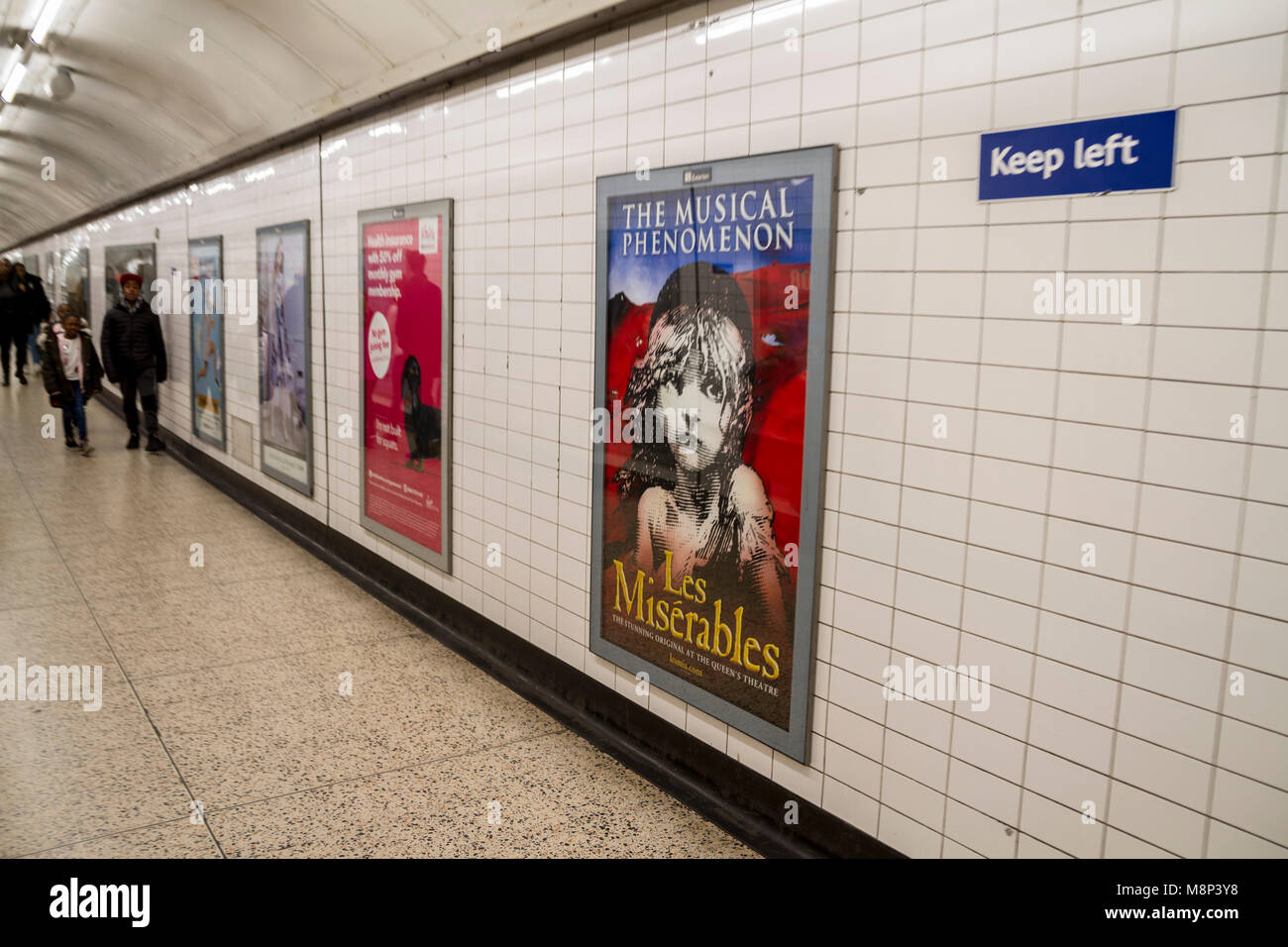 London Underground tube station, escalators, advert signs ...