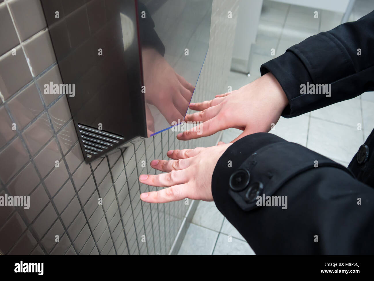 Hand dryers hi-res stock photography and images - Alamy