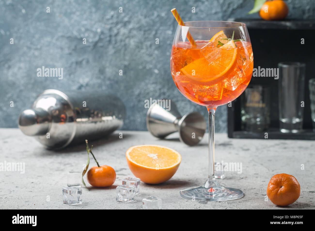 Classic Italian Aperol spritz cocktail in glass on gray background ...