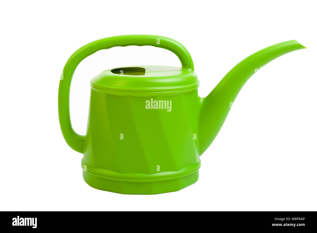 Plastic green watering can on white Stock Photo - Alamy